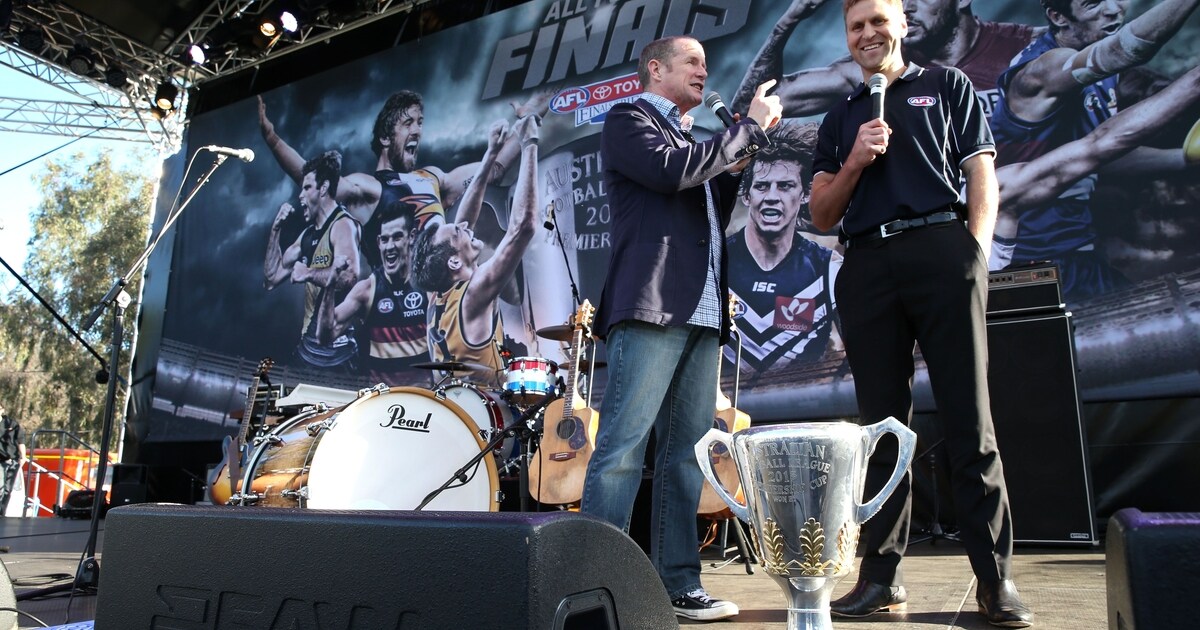 Premiership cup ambassador Kane Cornes takes the cup to Melbourne